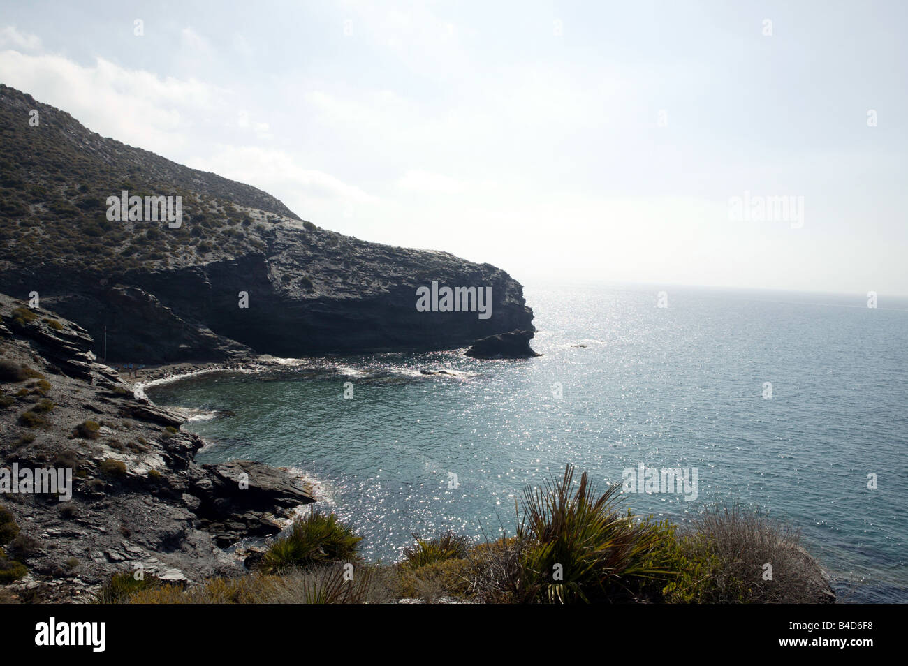 small cove or inlet seen from high viewpoint with small exclusive beach ...