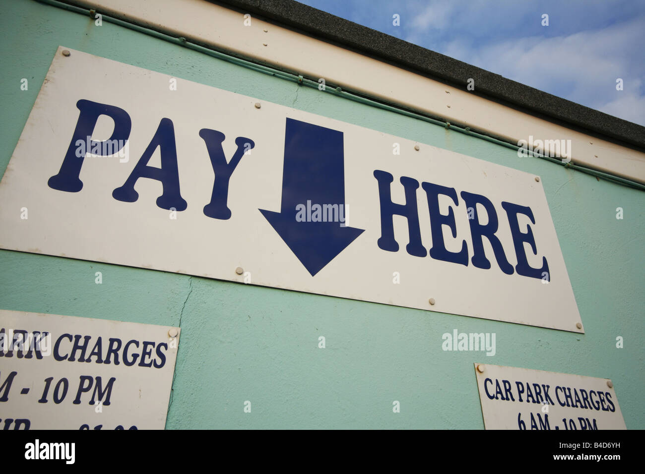 Pay Here Sign Stock Photo - Alamy