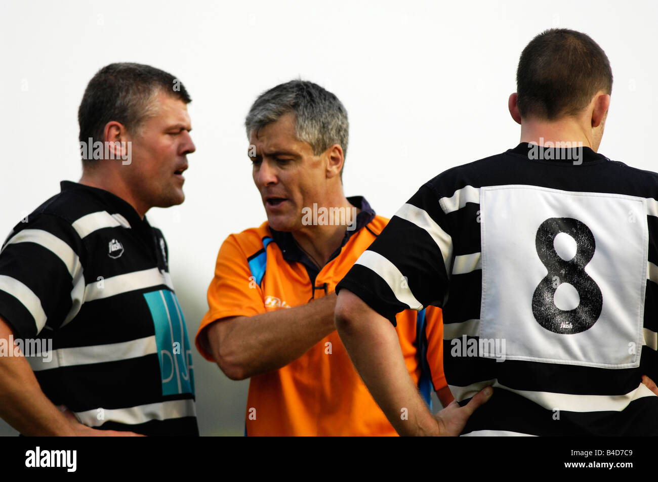 rugby referee avoids eye-contact when reprimanding a player with ...