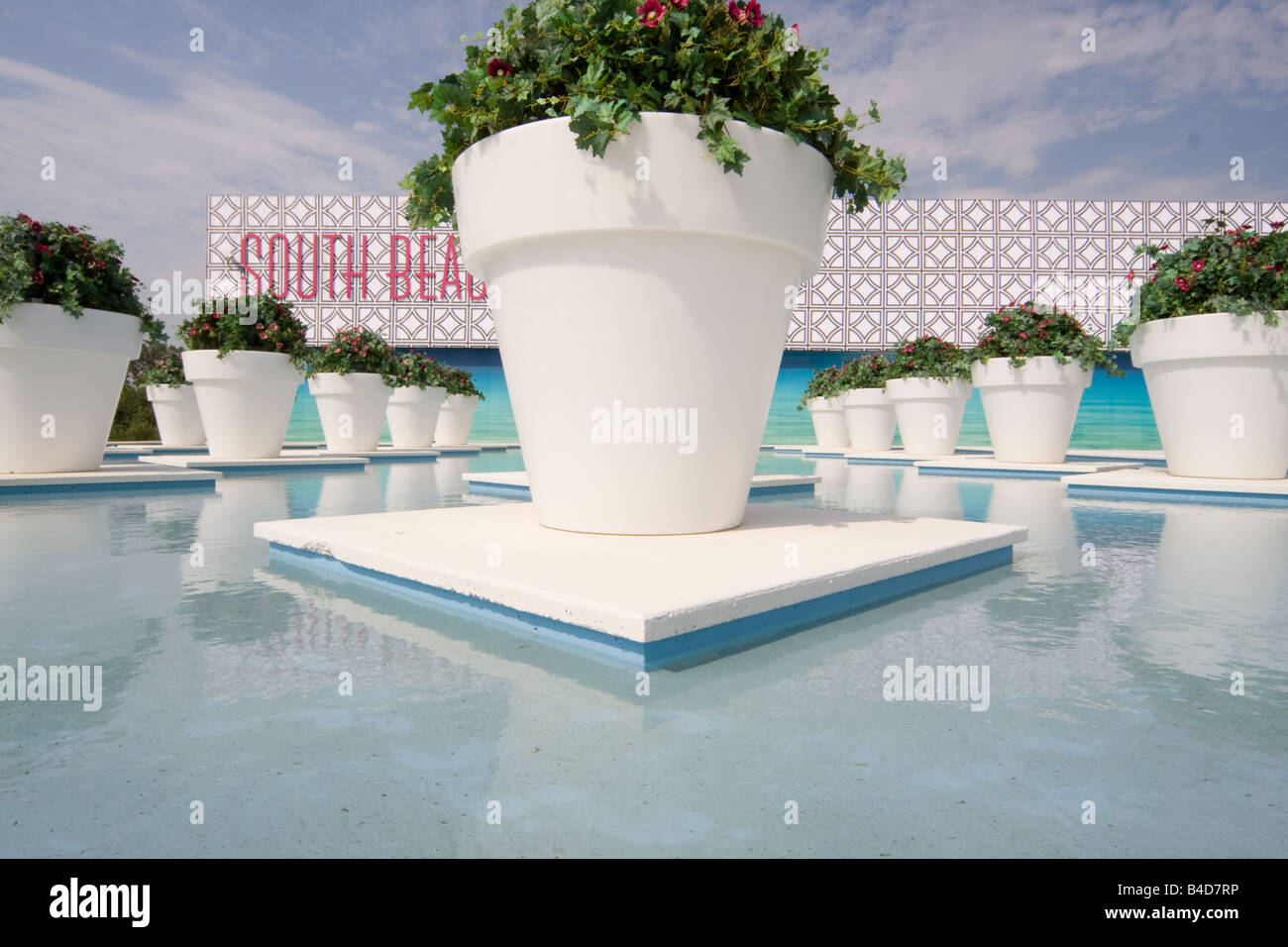 Large white flower pots in water Stock Photo - Alamy
