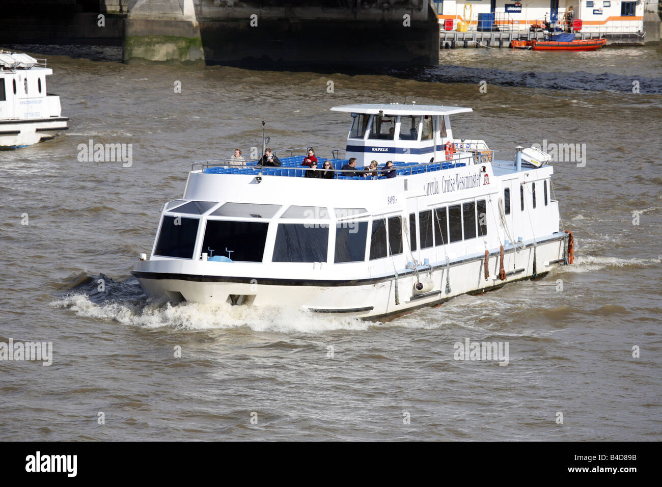 Tourists on Thames Launch Sightseeing Tour River Thames Waterloo Bridge ...