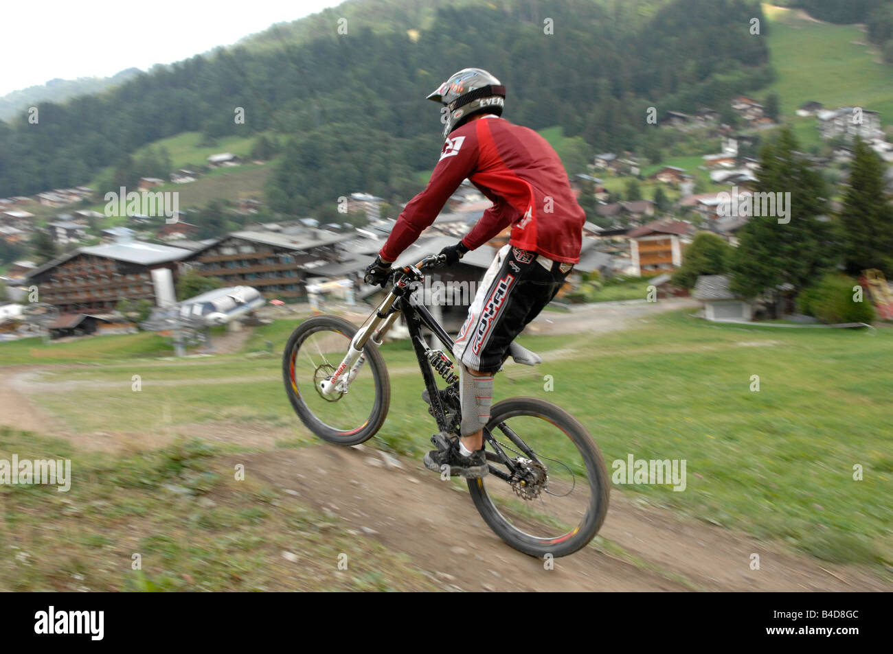Downhill Mountain Biker Stock Photo - Alamy