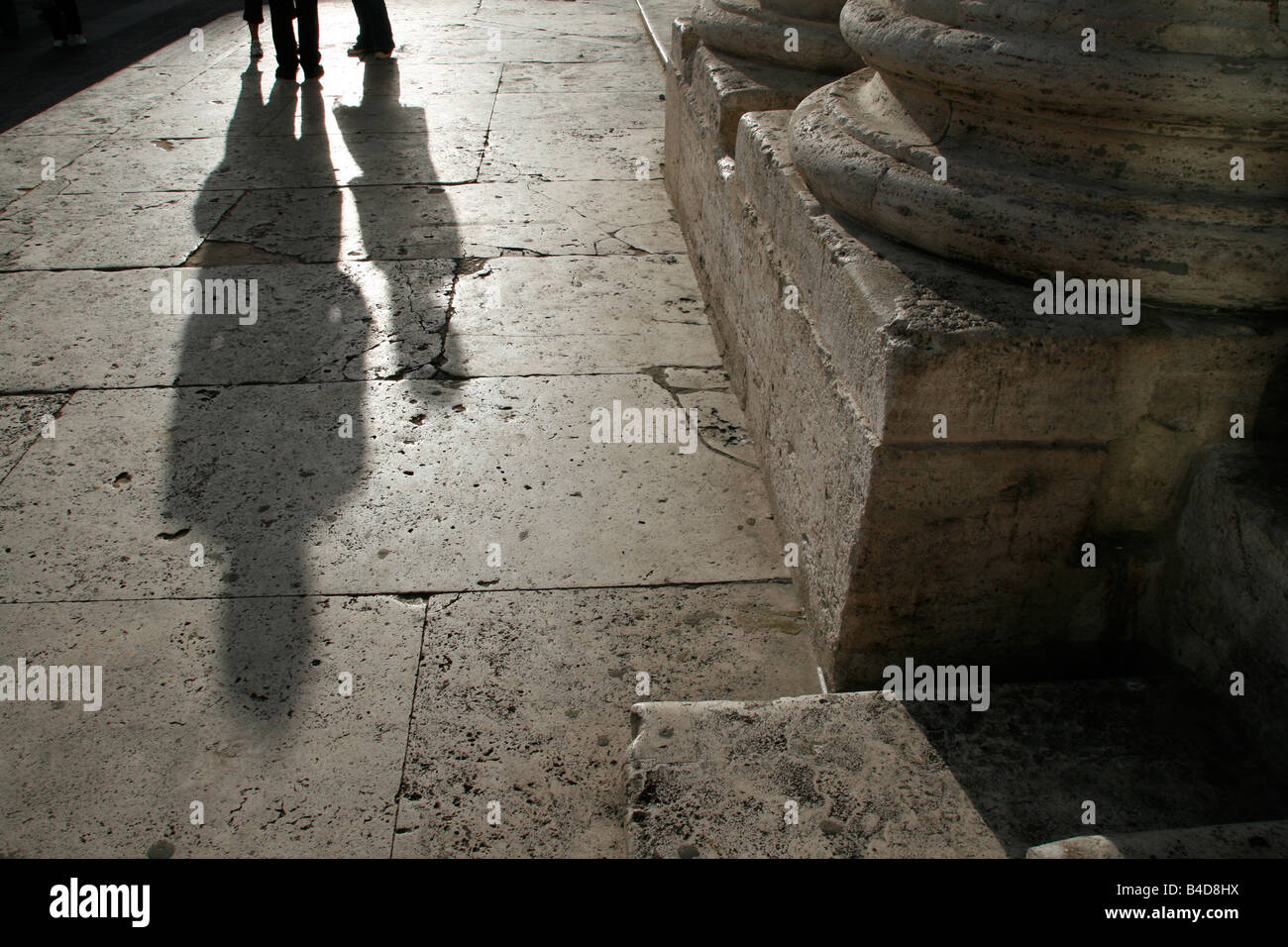 one person walking in street in city town Stock Photo - Alamy