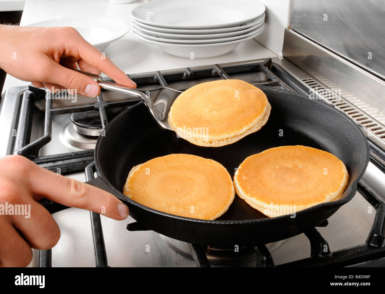 COOKING PANCAKES OR HOTCAKES Stock Photo - Alamy