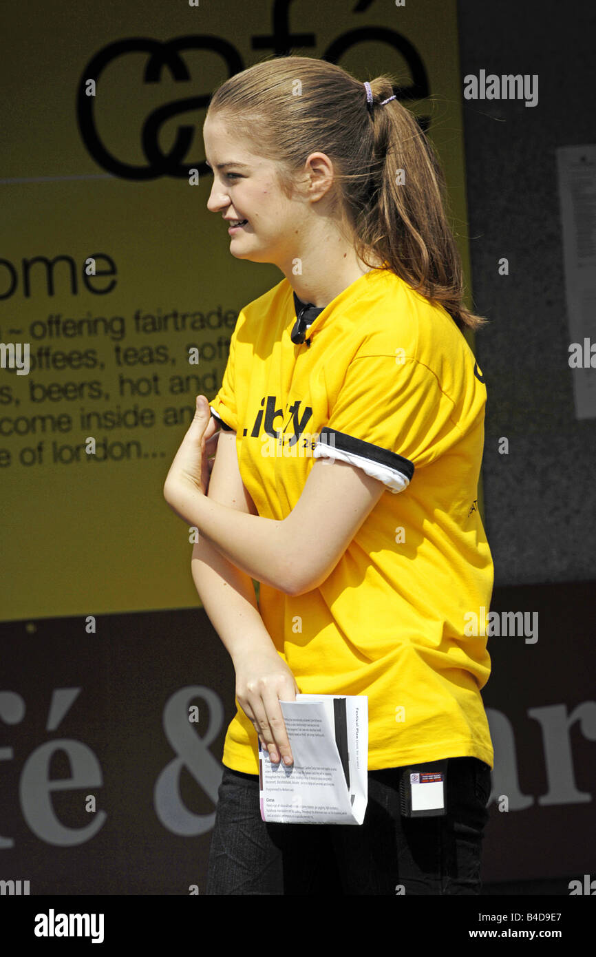 Bright yellow t shirts worn by female steward at the Liberty Festival ...