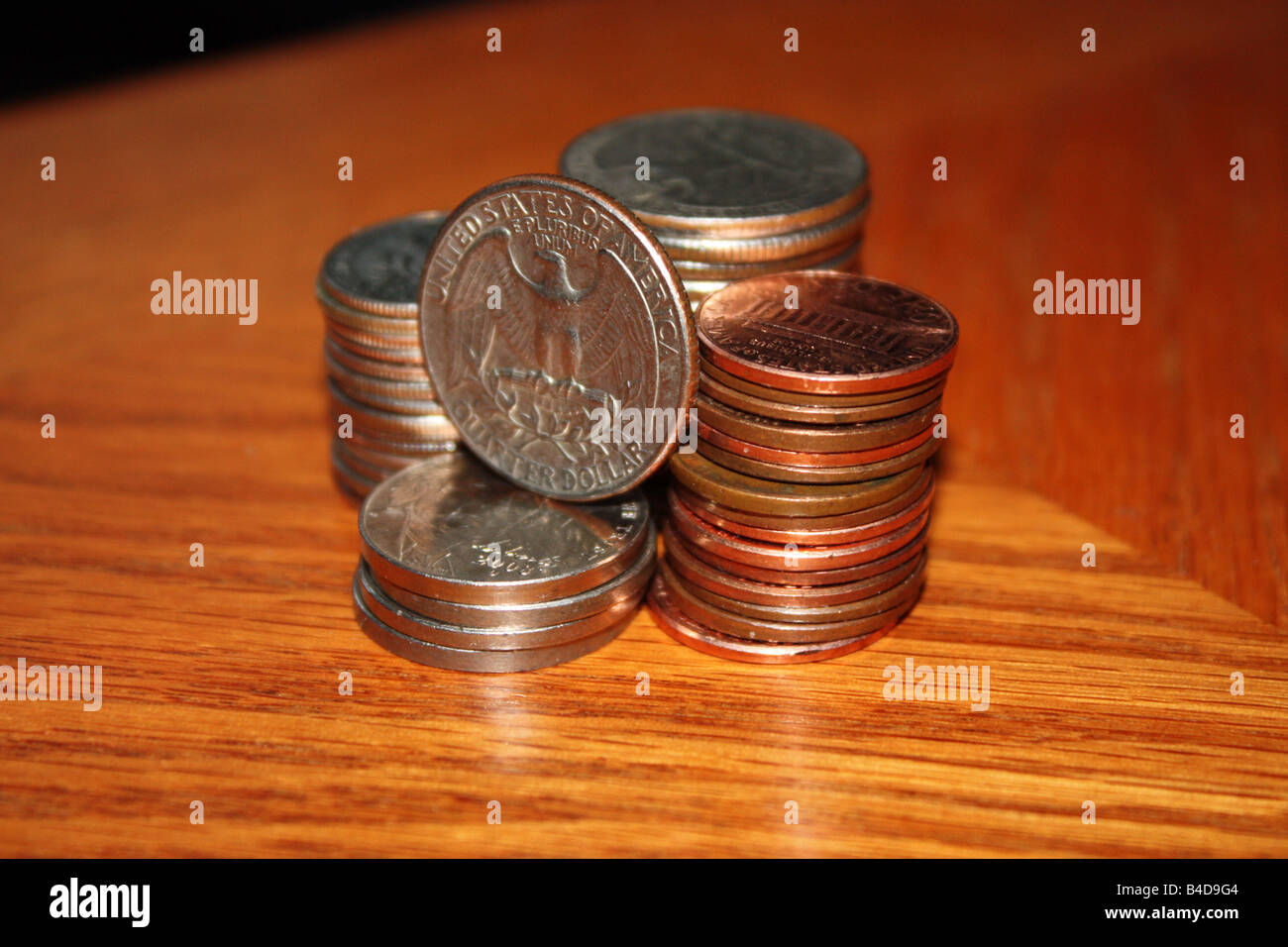US Currency coins- quarters, cents dime Stock Photo - Alamy