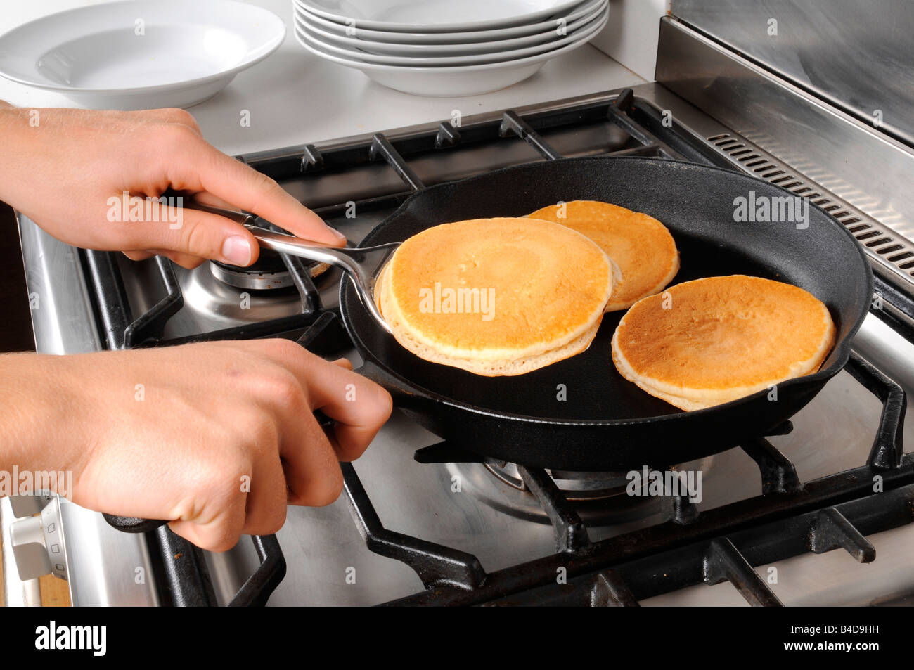 COOKING PANCAKES OR HOTCAKES Stock Photo - Alamy