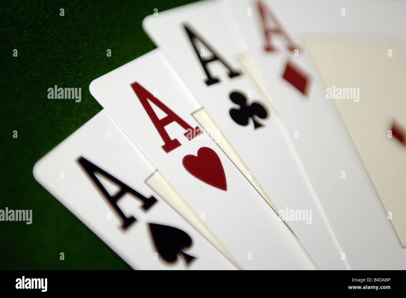 Four Aces in a hand of cards Stock Photo - Alamy