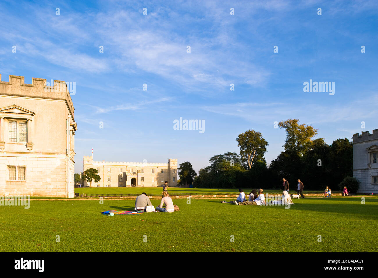 People relax by Syon House in Syon Park Brentford TW8 Middlesex London ...