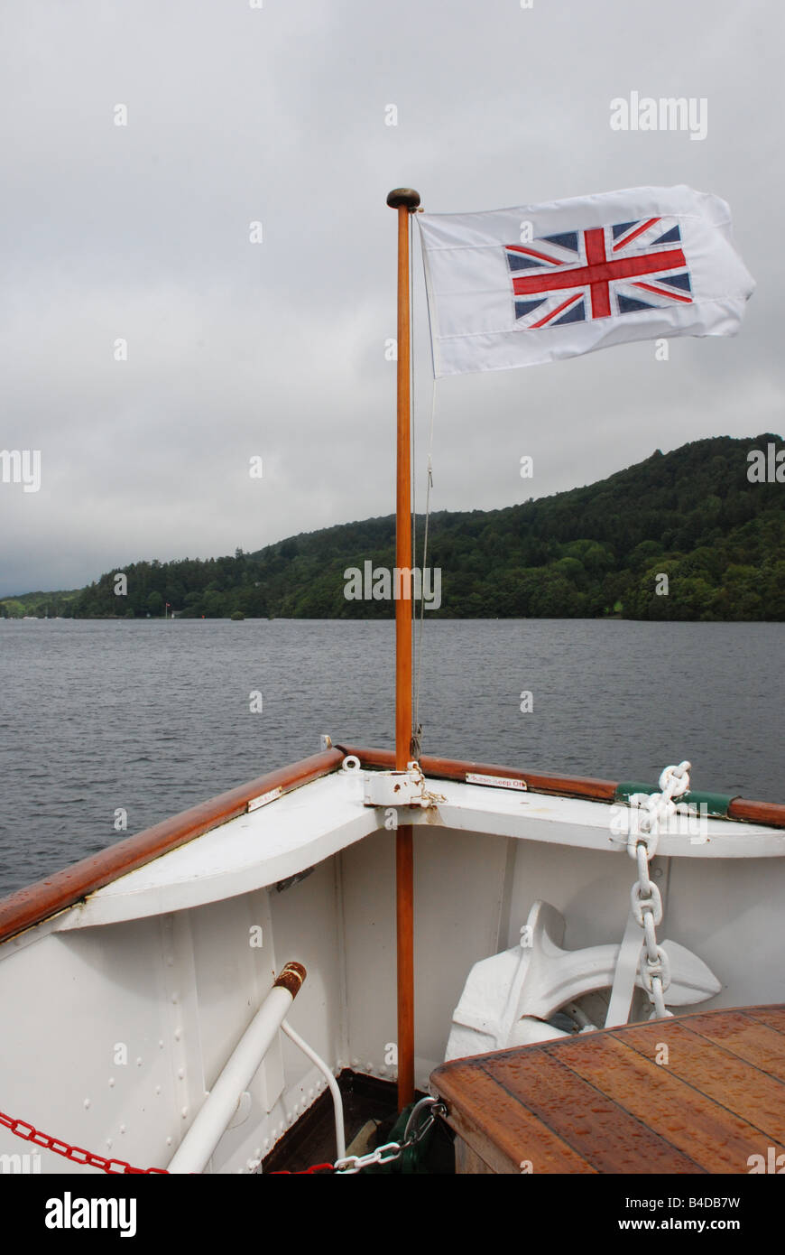 British flag on the front of a steam cruiser on Lake Windermere Stock ...