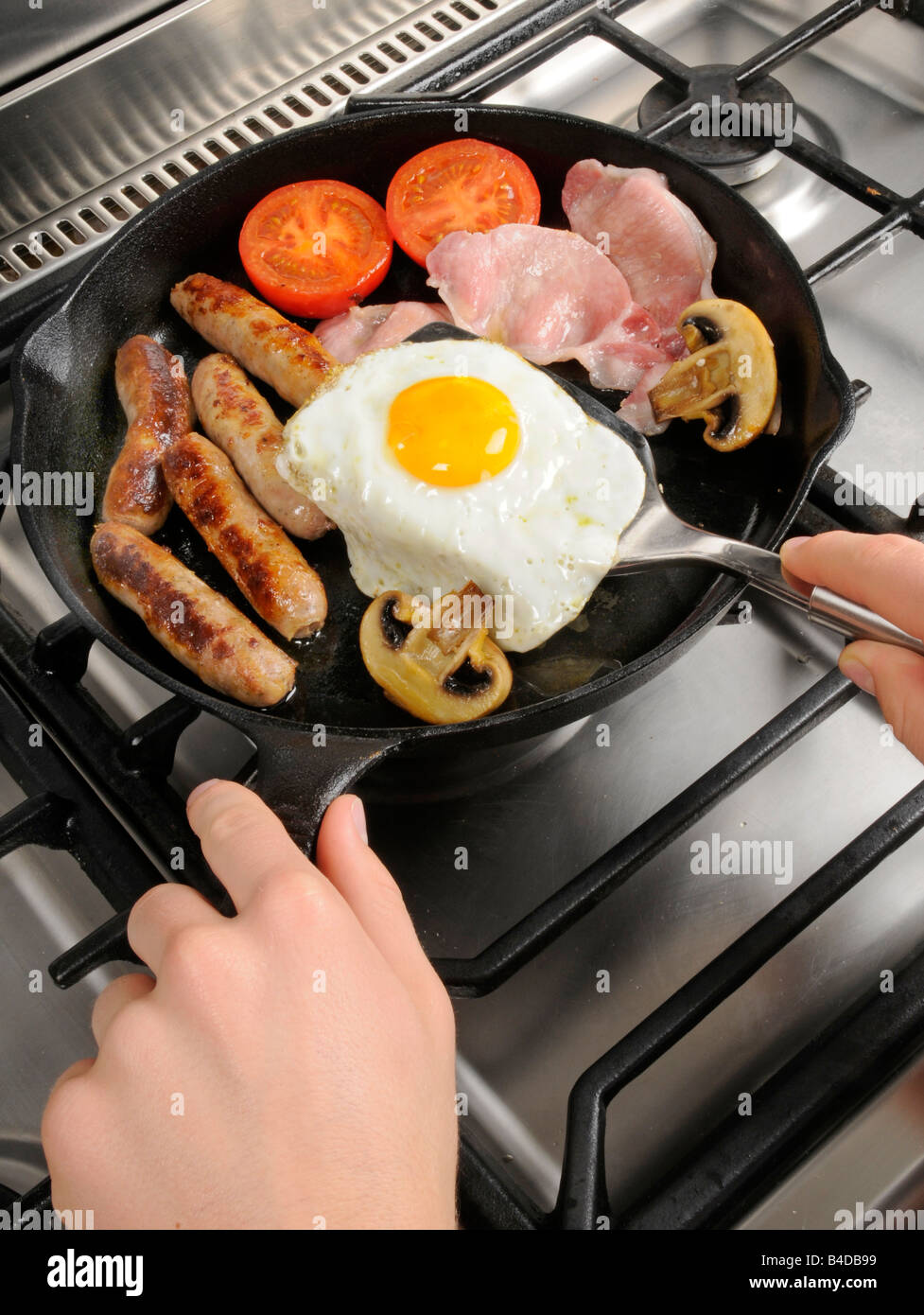 MAN COOKING FRIED BREAKFAST Stock Photo - Alamy