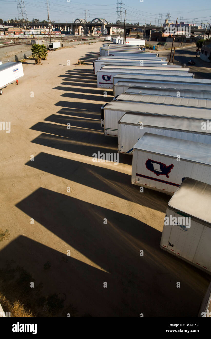 shipping containers lined up near the LA River Los Angeles County ...