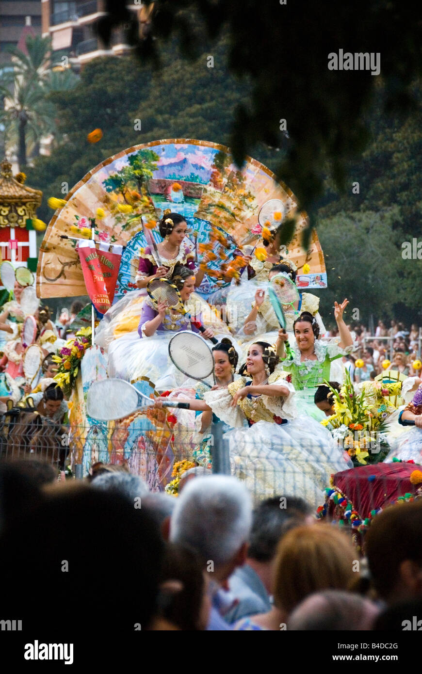 Spanish woman dressed in traditional costume on a float during the ...