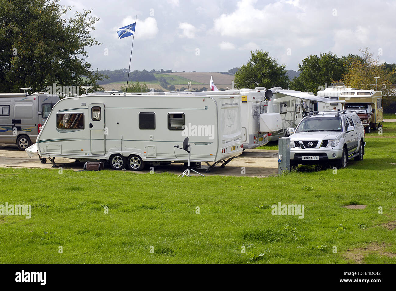 Caravans and Motorhomes at a basic campsite in England during the wet ...