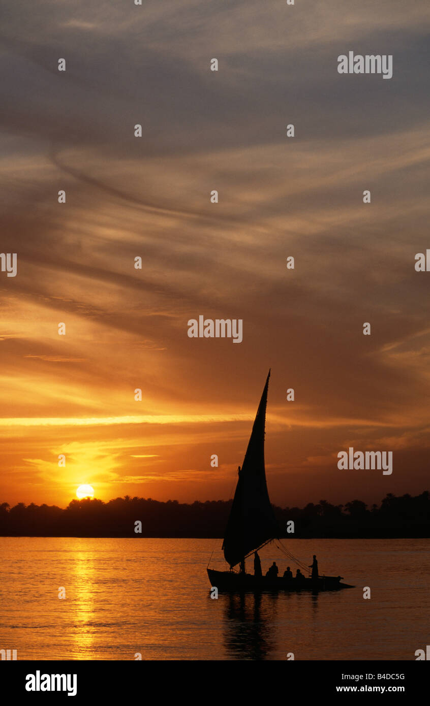 Felucca at sunset, Aswan, Egypt Stock Photo - Alamy