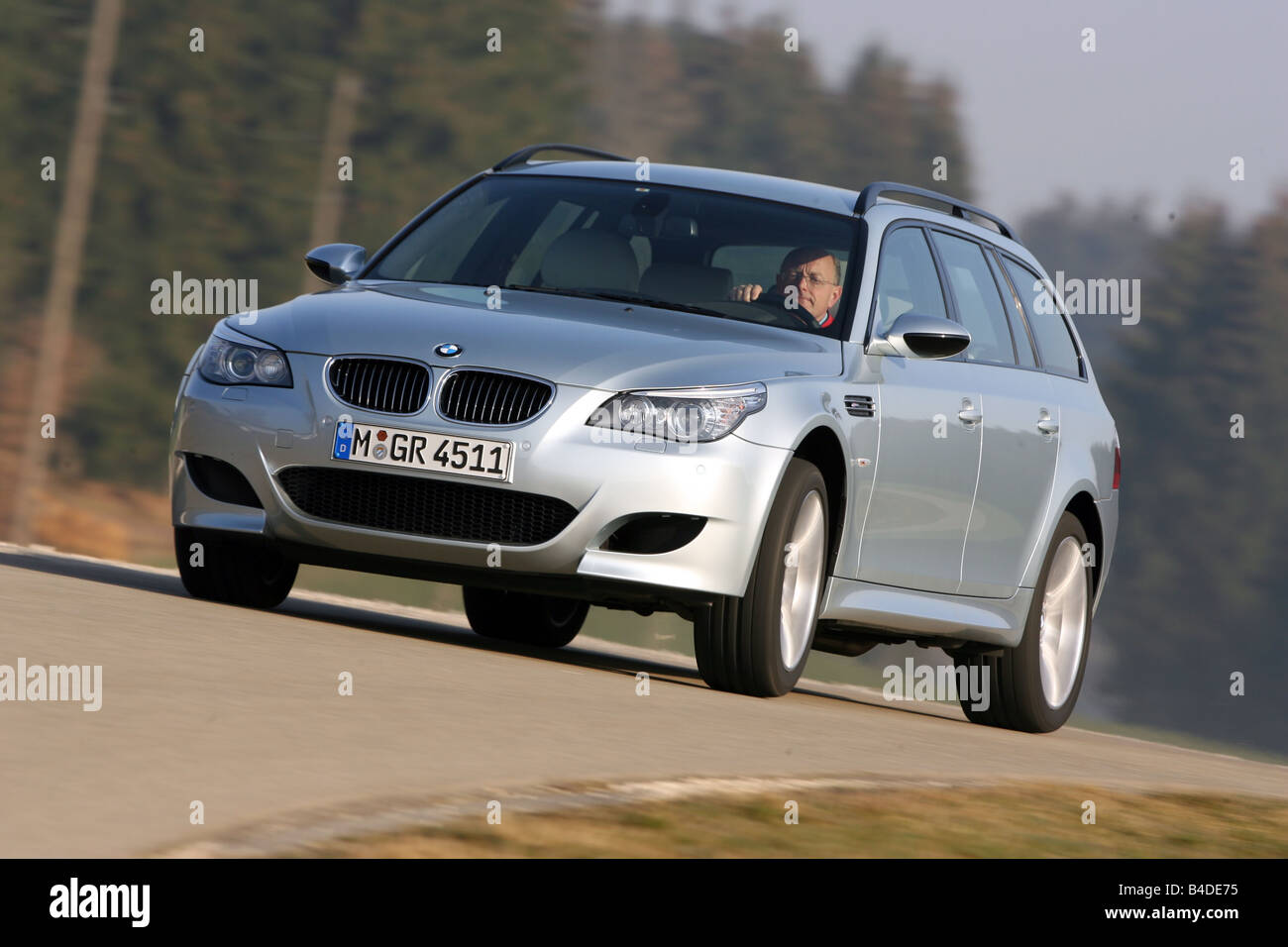 BMW M5 Touring, model year 2006-, silver, driving, diagonal from the ...