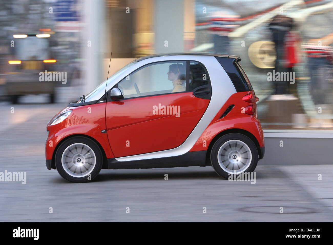 Smart Fortwo Passion, model year 2007-, red, driving, side view, City ...