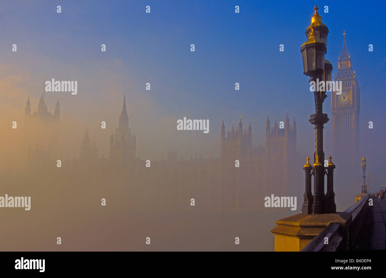 Foggy day in London, Westminster Bridge, mist over Houses of Parliament ...