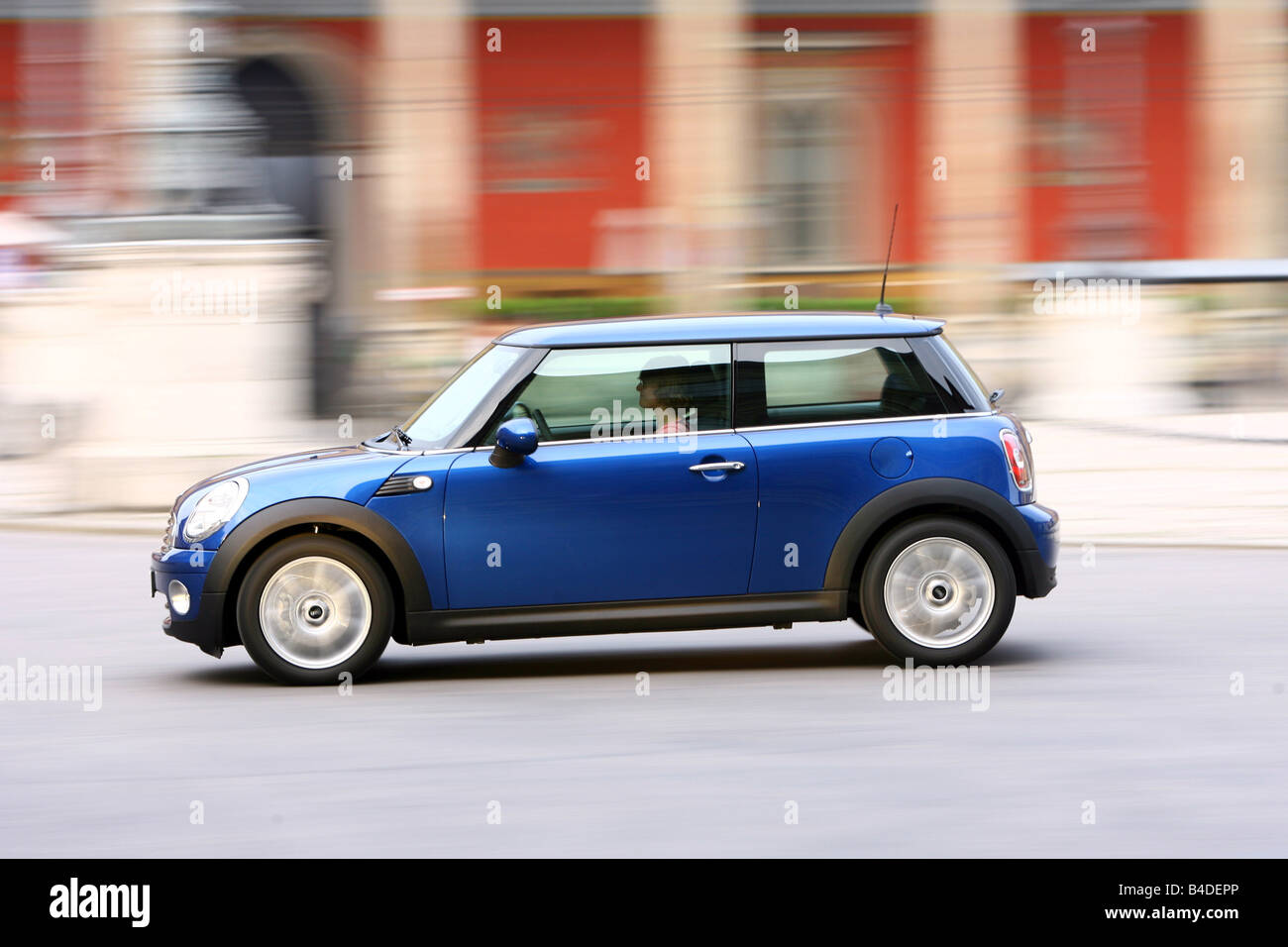 Mini One, model year 2007-, blue moving, side view, City Stock Photo ...