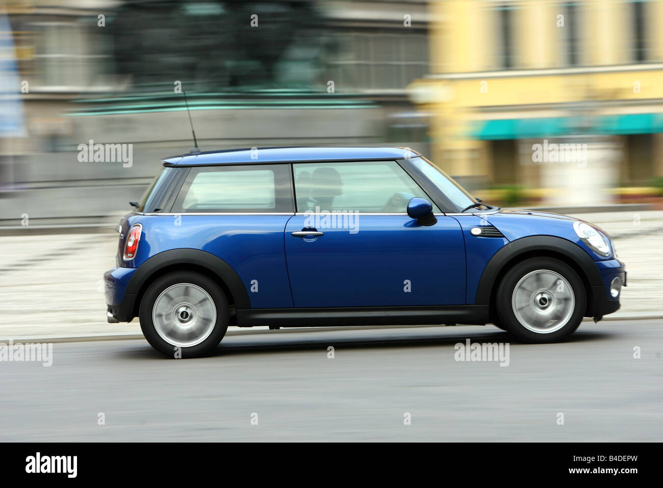 Mini One, model year 2007-, blue moving, side view, City Stock Photo ...
