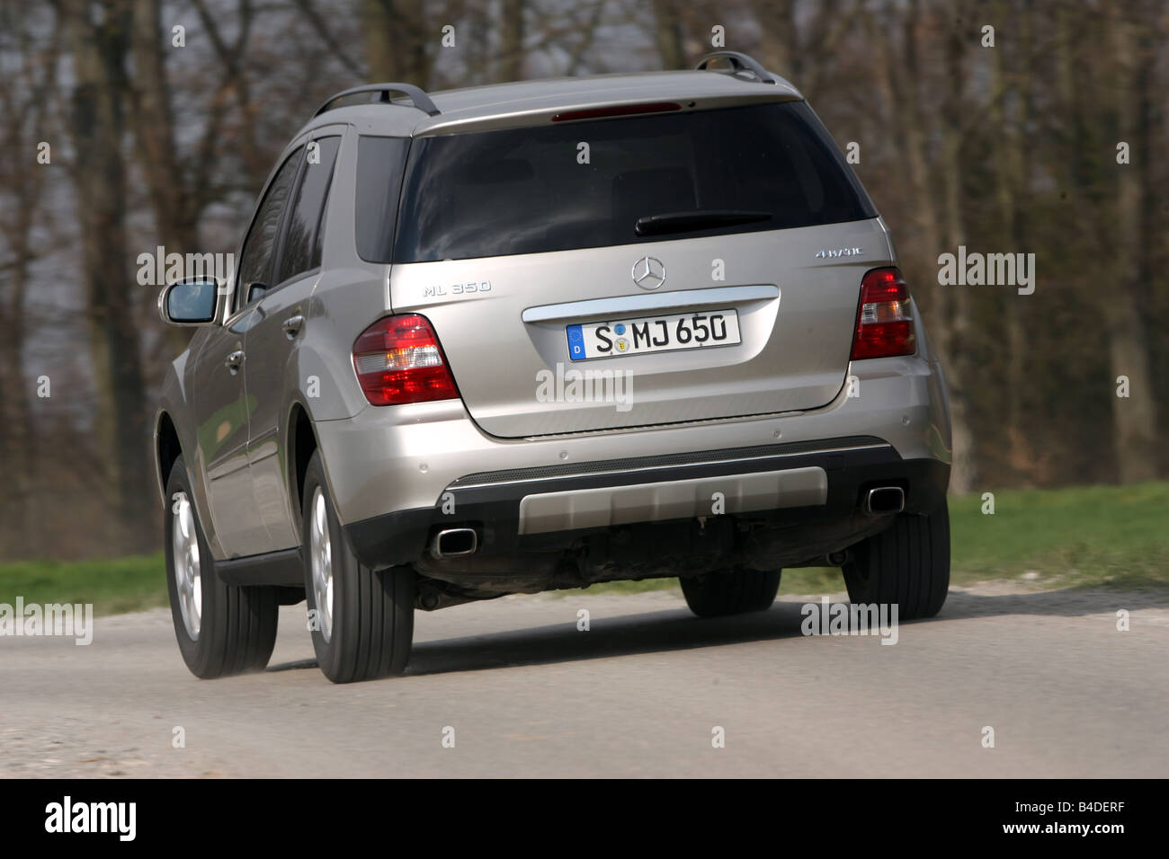Mercedes ML 350, model year 2005-, silver, driving, diagonal from the ...