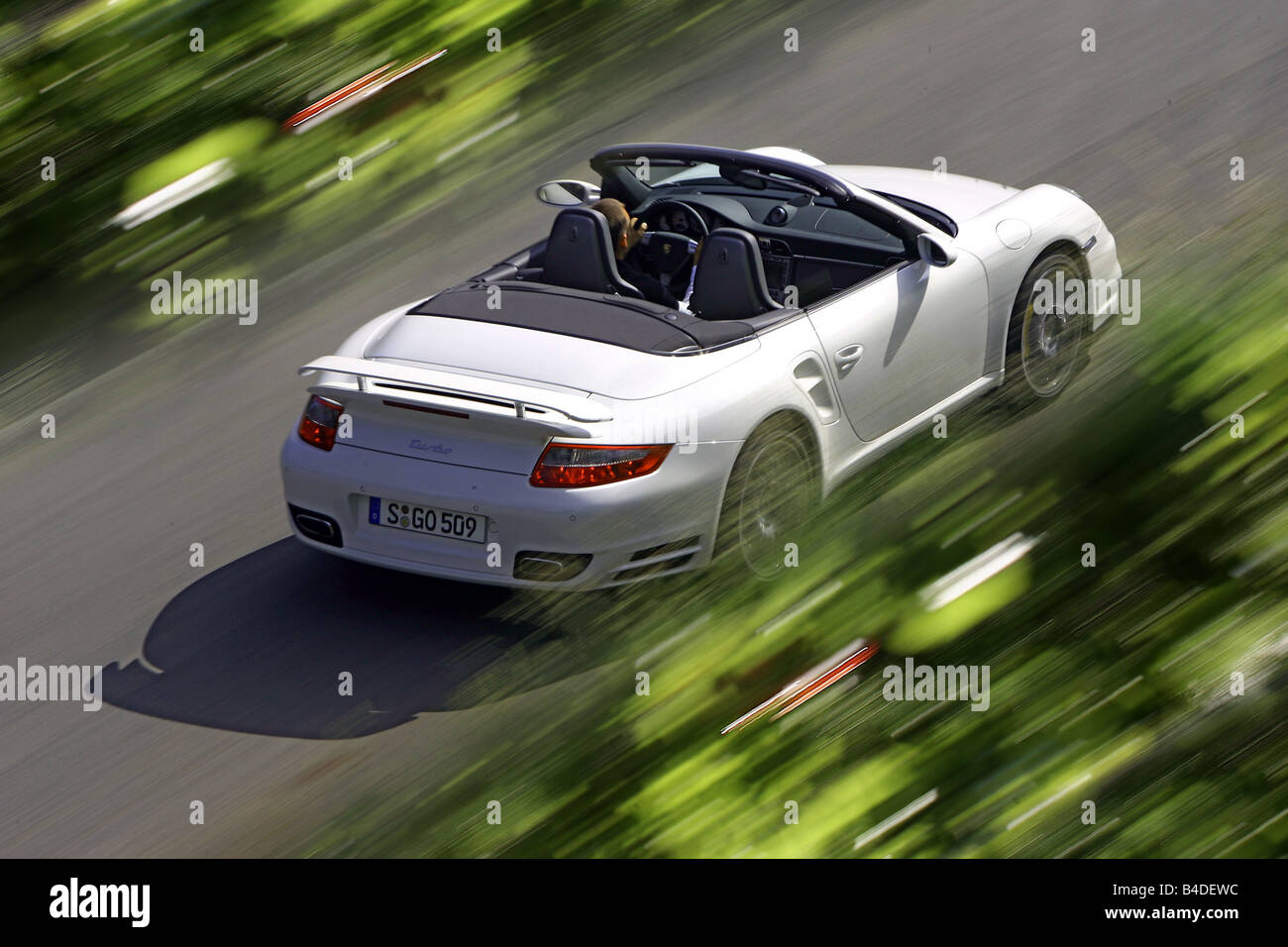 Porsche 911 Turbo Convertible, model year 2007-, white, driving ...