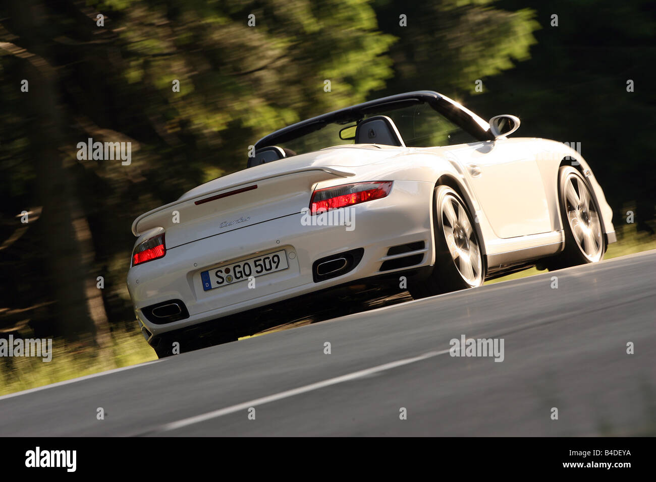 Porsche 911 Turbo Convertible, model year 2007-, white, driving ...