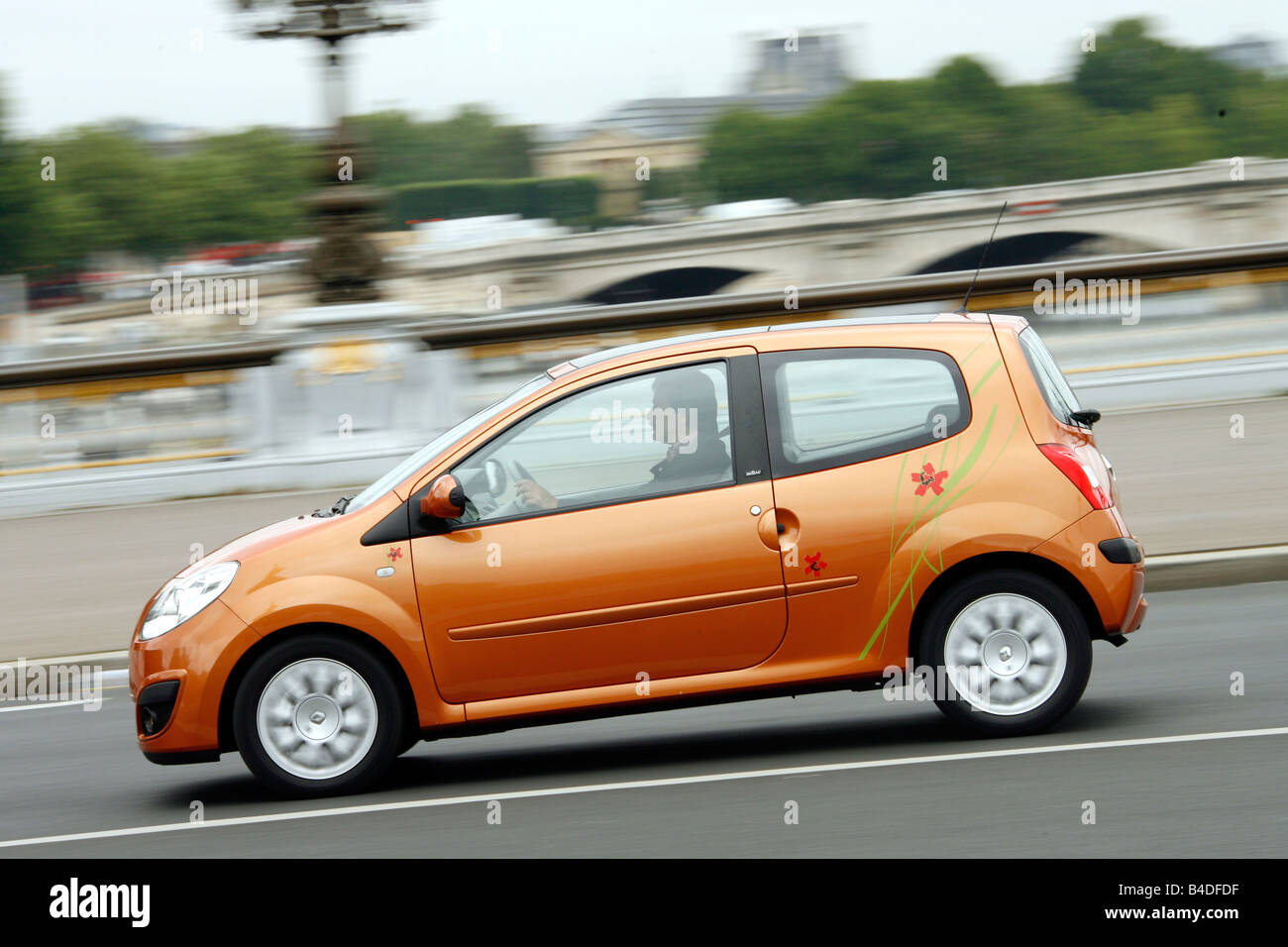 Renault Twingo, model year 2007-, orange , driving, side view, City ...