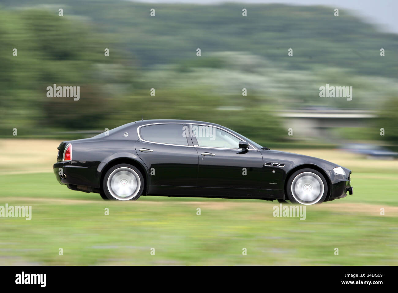 Maserati Quattroporte Sport GT, model year 2007-, black, driving, side ...