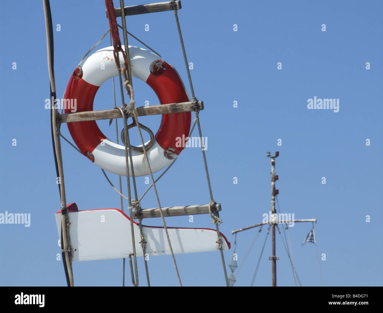life saving rubber ring on ship and blue sky Stock Photo - Alamy