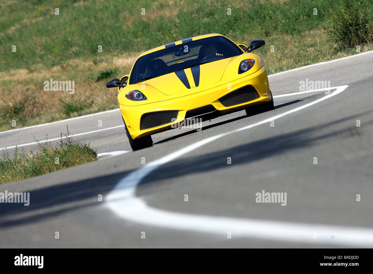 Ferrari 430 Scuderia, model year 2007-, yellow, driving, diagonal from ...