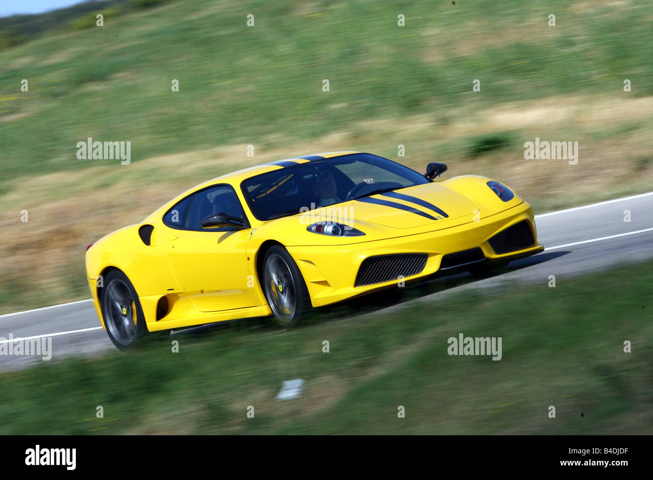Ferrari 430 Scuderia, model year 2007-, yellow, driving, diagonal from ...