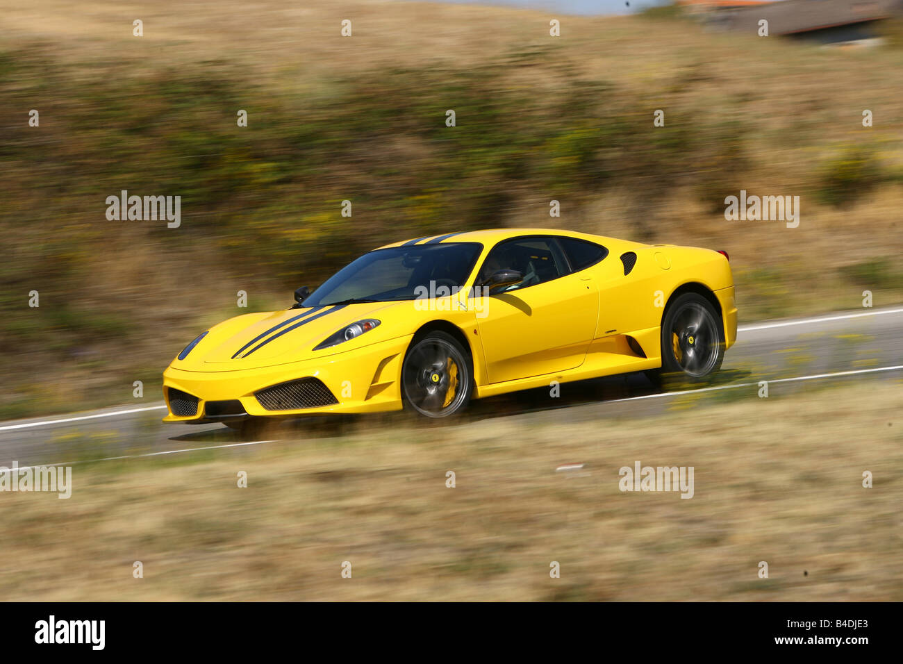 Ferrari 430 Scuderia, model year 2007-, yellow, driving, diagonal from ...