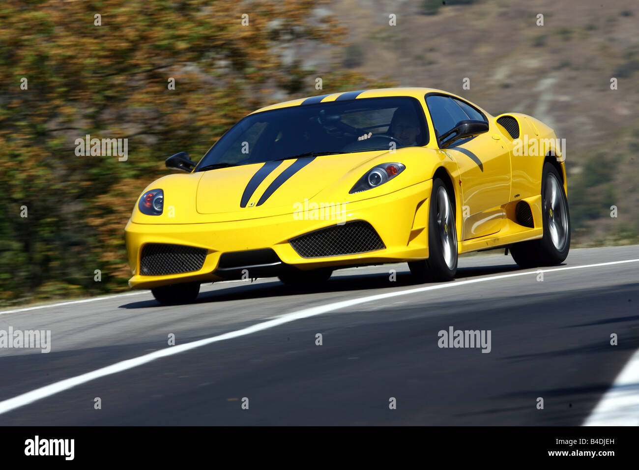 Ferrari 430 Scuderia, model year 2007-, yellow, driving, diagonal from ...