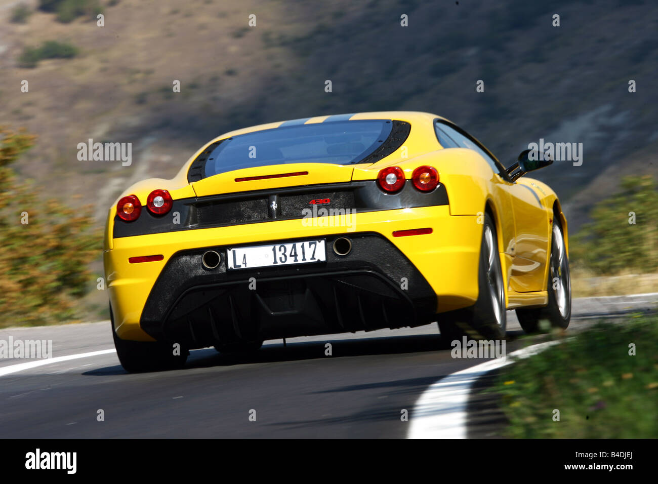 Ferrari 430 Scuderia, model year 2007-, yellow, driving, diagonal from ...