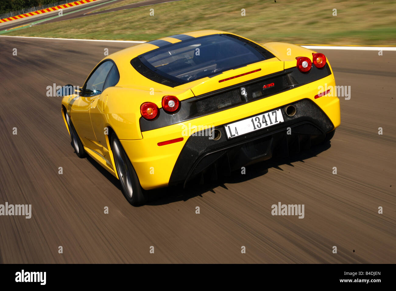 Ferrari 430 Scuderia, model year 2007-, yellow, driving, diagonal from ...