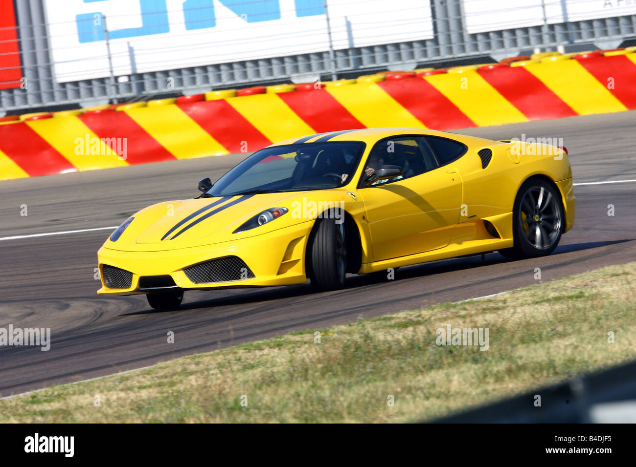 Ferrari 430 Scuderia, model year 2007-, yellow, driving, diagonal from ...
