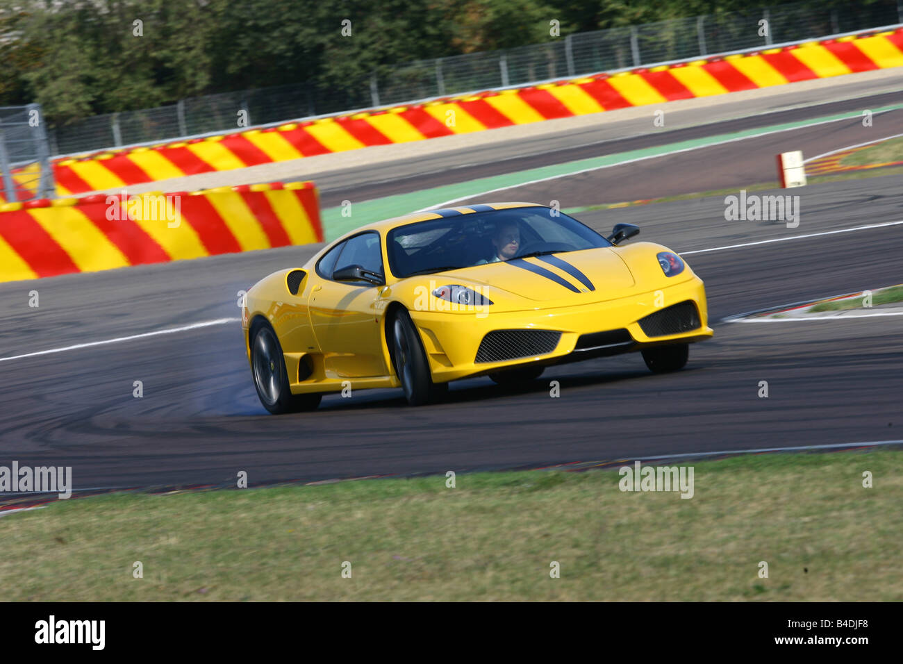 Ferrari 430 Scuderia, model year 2007-, yellow, driving, diagonal from ...