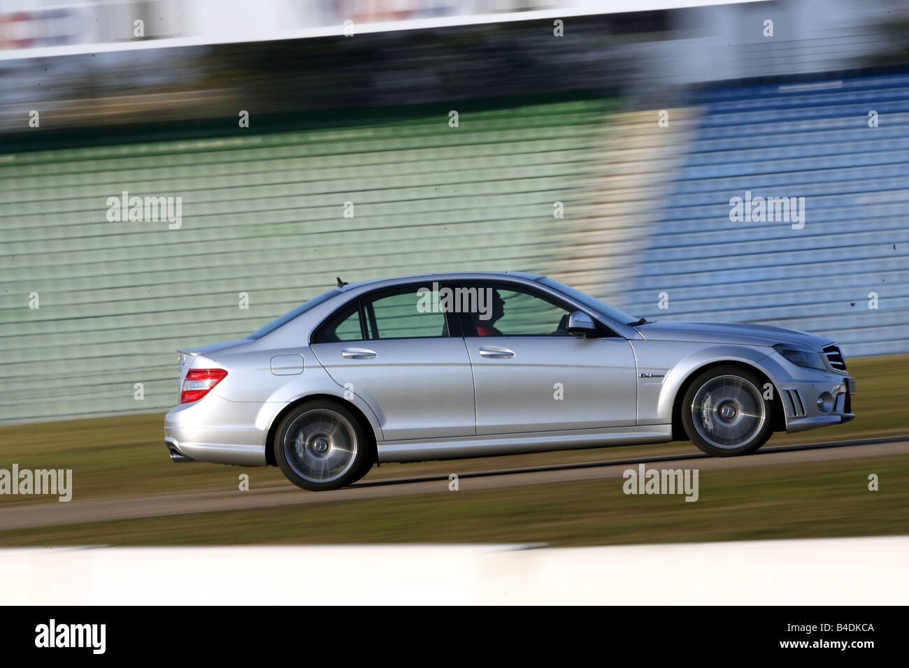 Mercedes C 63 AMG, model year 2007-, silver, driving, side view, test ...