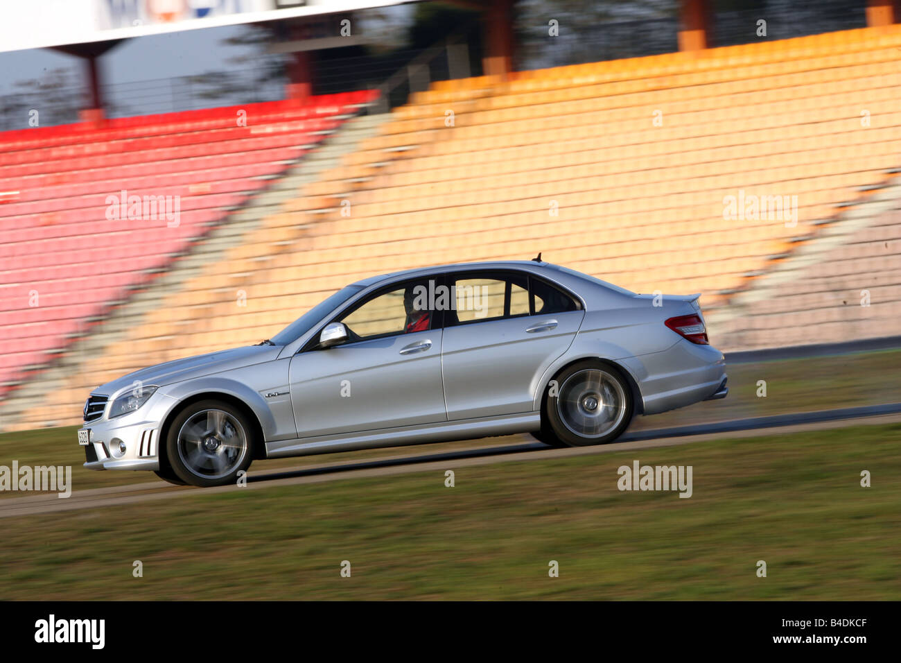 Mercedes C 63 AMG, model year 2007-, silver, driving, side view, test ...