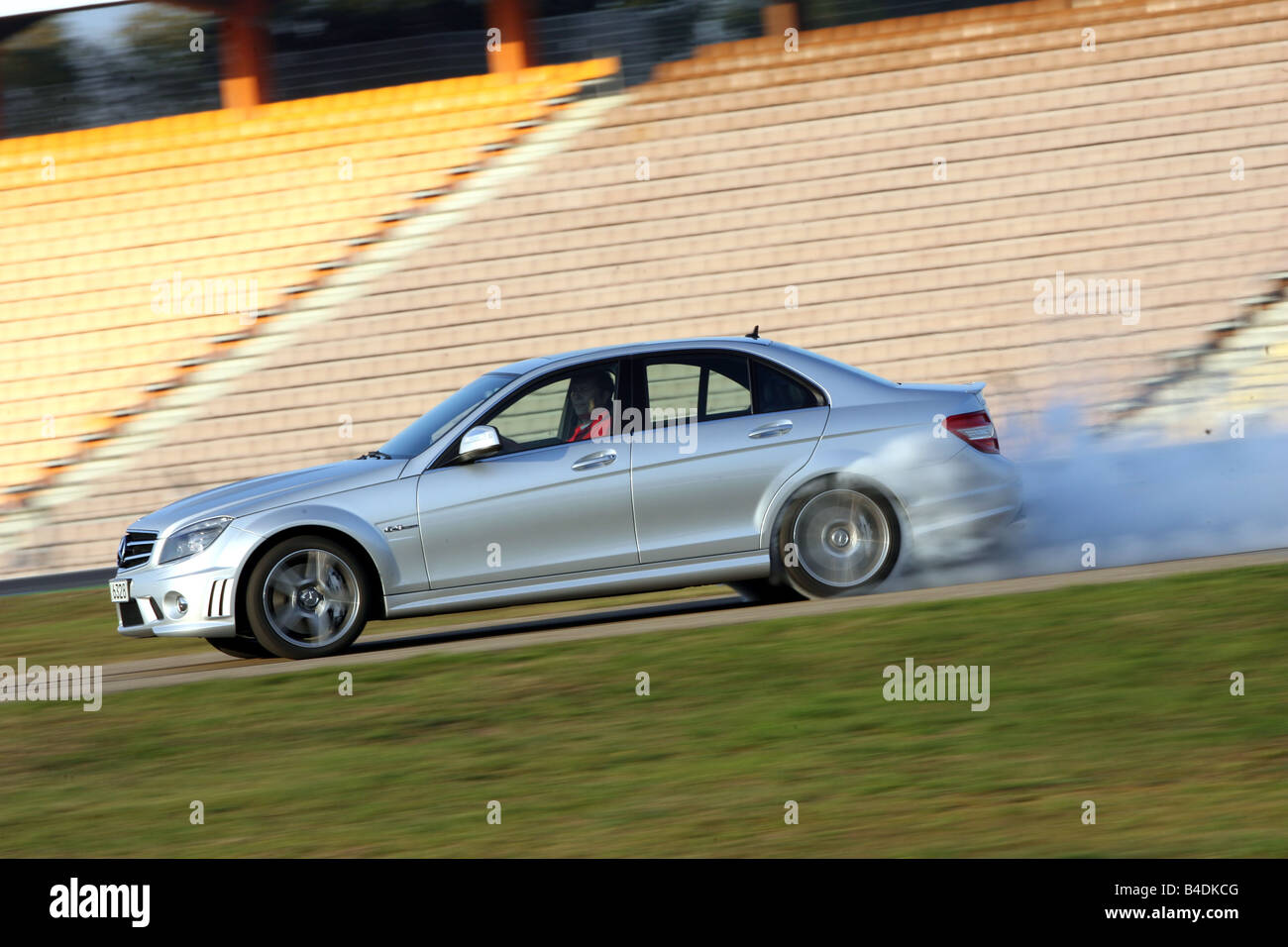 Mercedes C 63 AMG, model year 2007-, silver, driving, side view, test ...