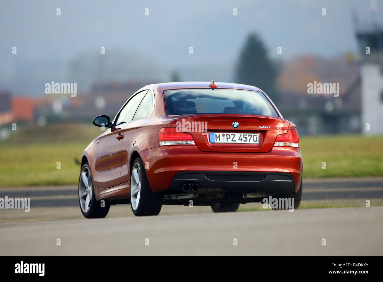BMW 135i Coupe, driving, diagonal from the back, rear view, country ...