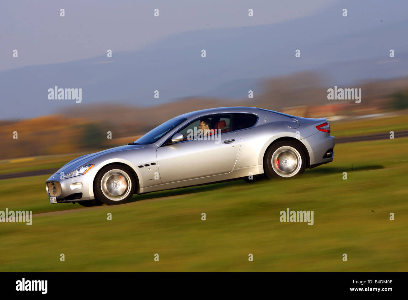 Maserati Gran Turismo, silver, model year 2007-, driving, side view ...