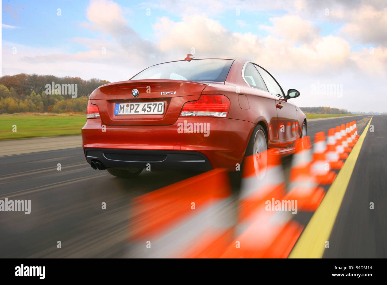 BMW 135i Coupe, driving, diagonal from the back, rear view, Pilonen ...
