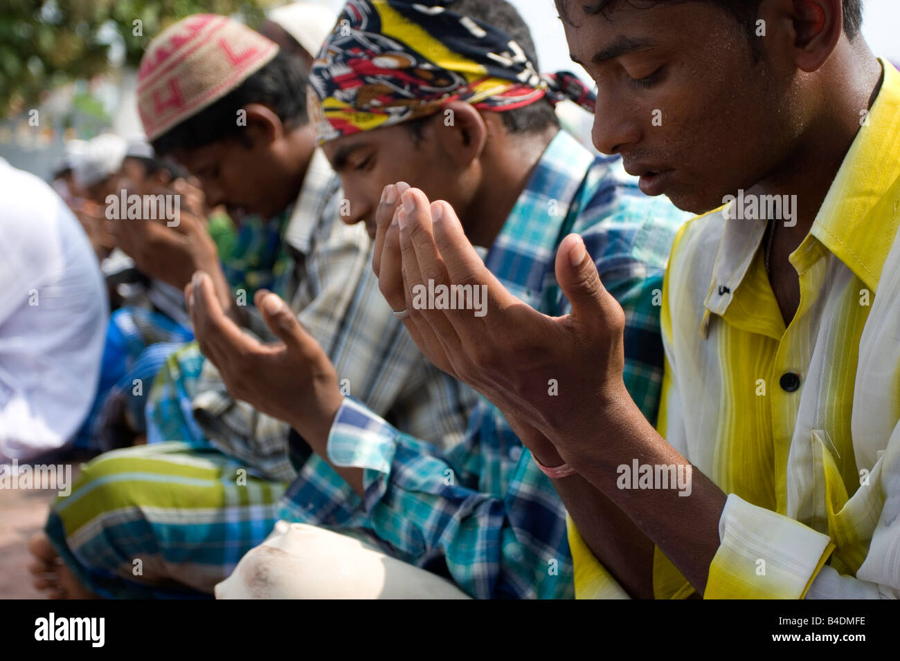 people from Muslim community offer prayers to Allah(God) at Id festival ...