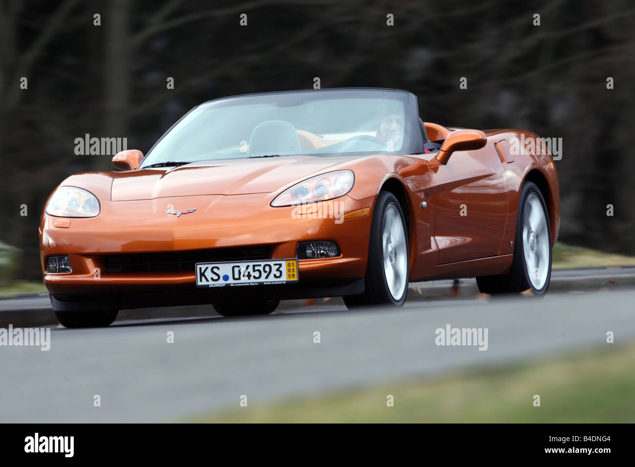 Corvette C6, rust-red model year 2008, orange -metallic, driving ...