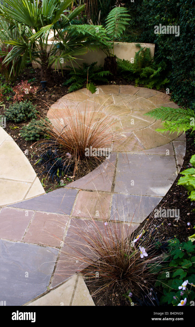 creative paving in modern english garden Stock Photo - Alamy