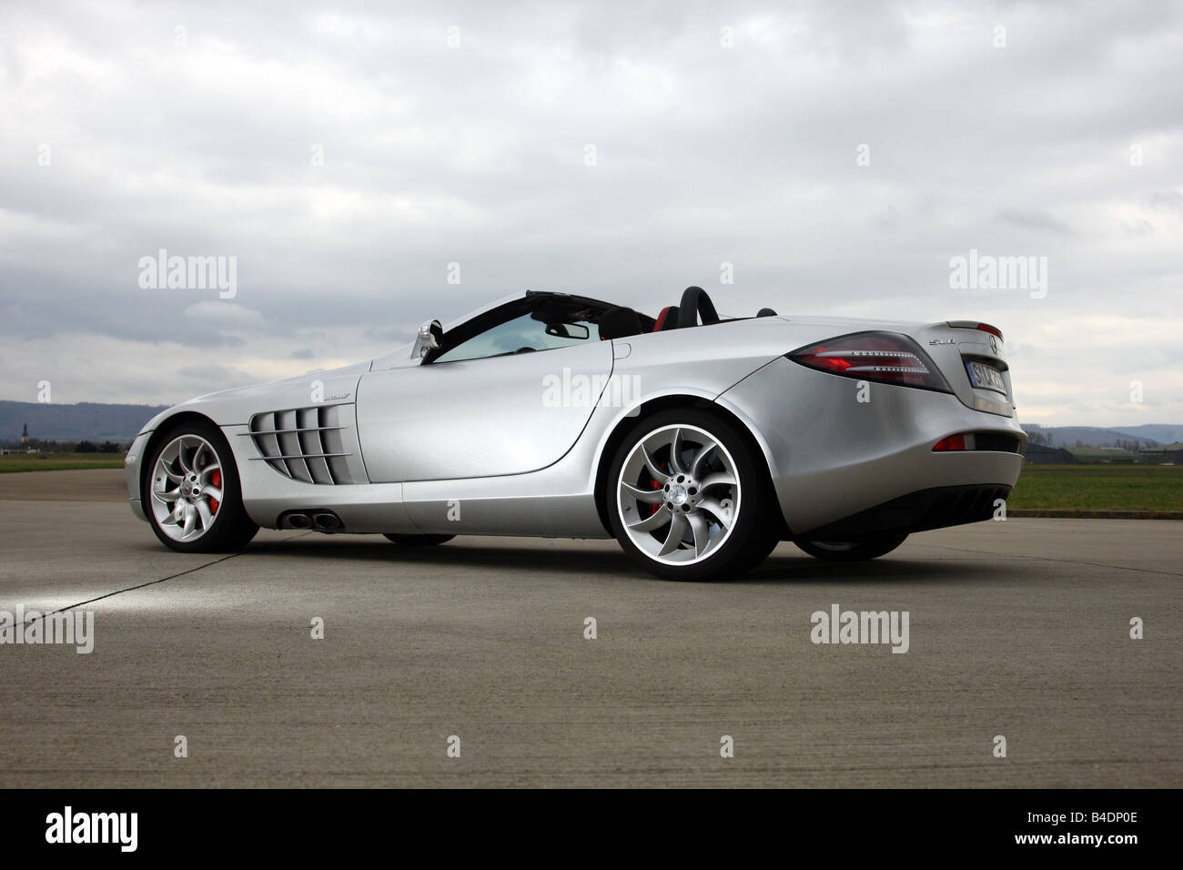 Mercedes SLR McLaren, model year 2008-, silver, standing, upholding ...