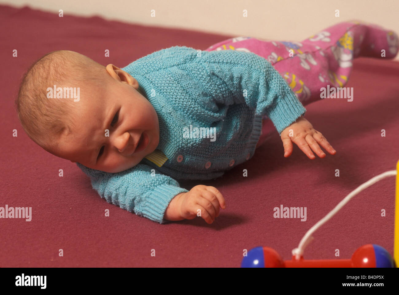 Baby tummy reaching hi-res stock photography and images - Alamy