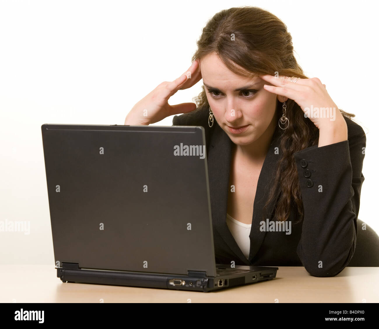 Woman stressed on computer Stock Photo - Alamy